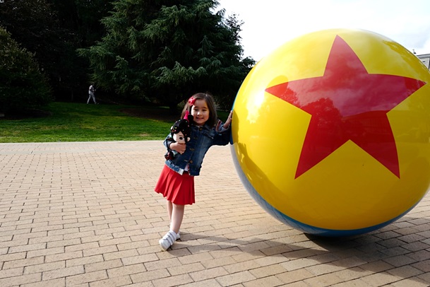 Scarlet poses by the Pixar ball at the Pixar Animation Studios in ...